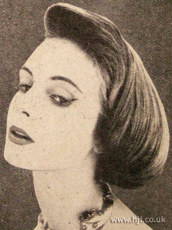 1960s curly fringe hairstyle