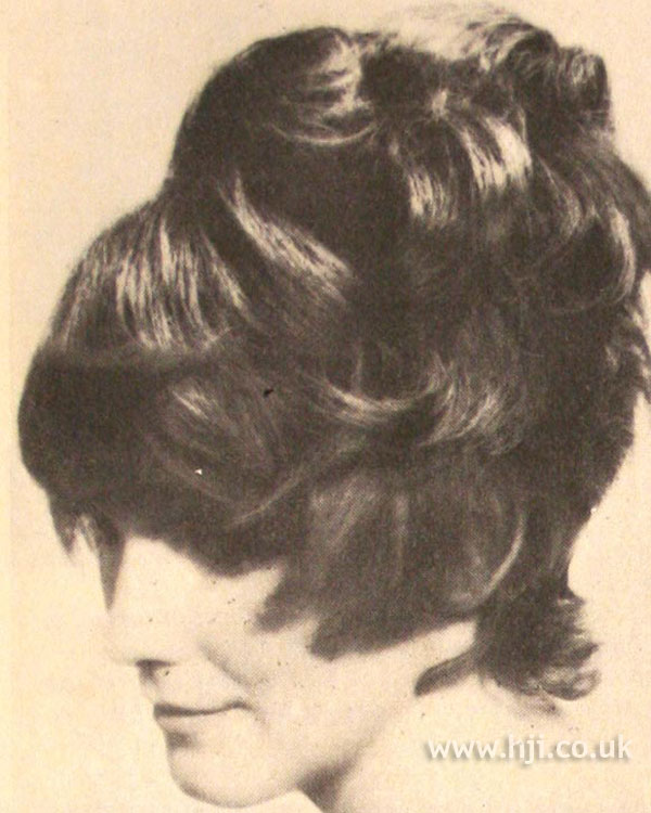 Short 1970s bouffant with sweeping fringe