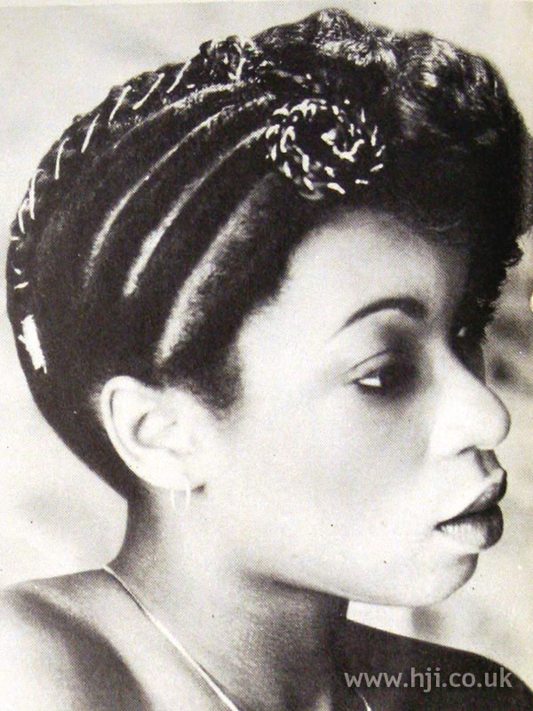 Sleek side-parted 1970s men's style