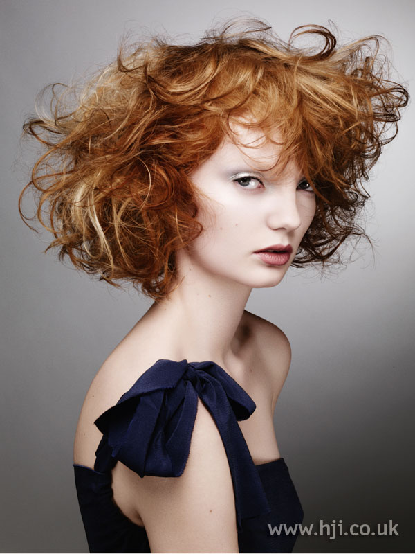 1969 glossy roll hairstyle