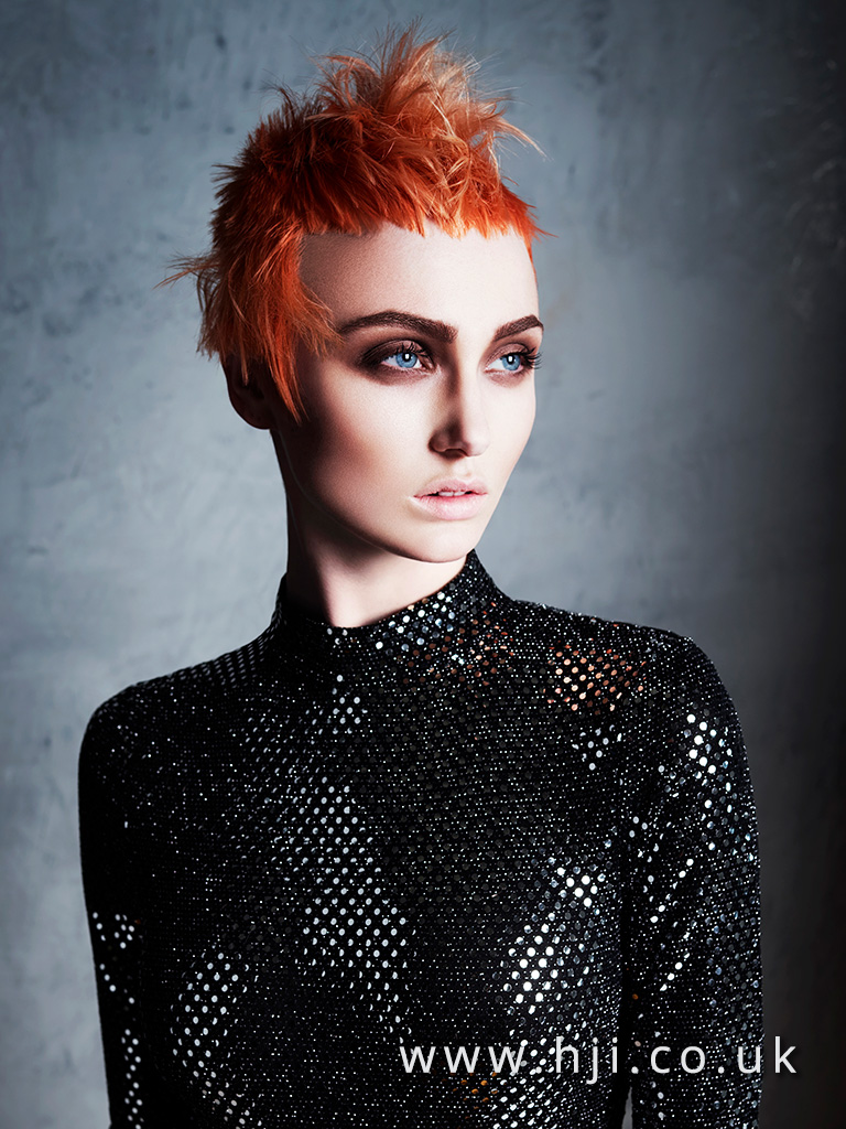 2017 textured crop hairstyle with vibrant redhead colour