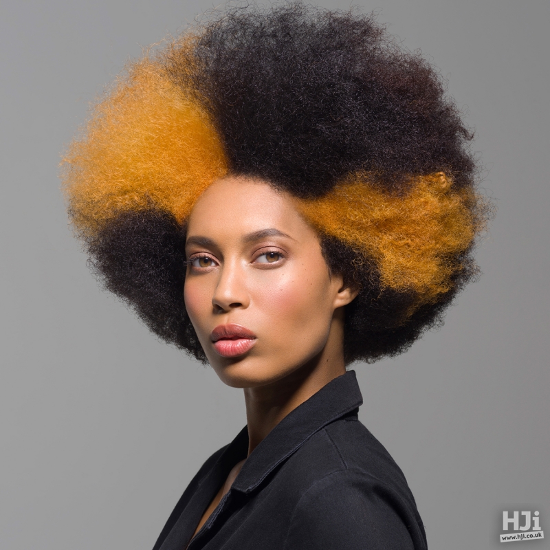 Afro curls with creative irregular orange colouring