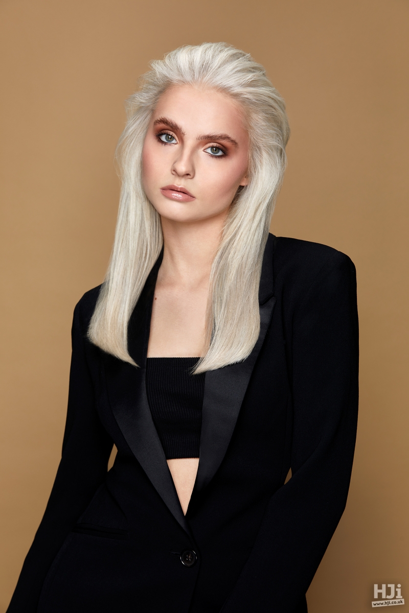 Long pearl blonde hair slicked back