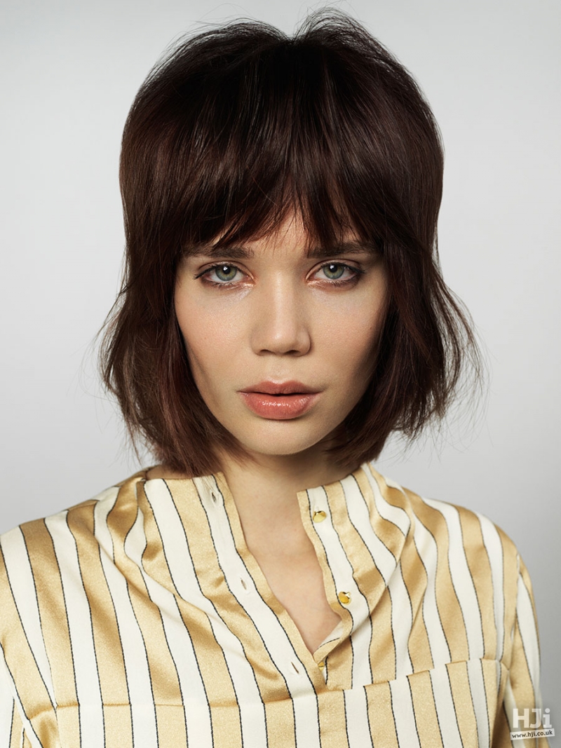 Chocolate brown bob with short fringe and natural texture
