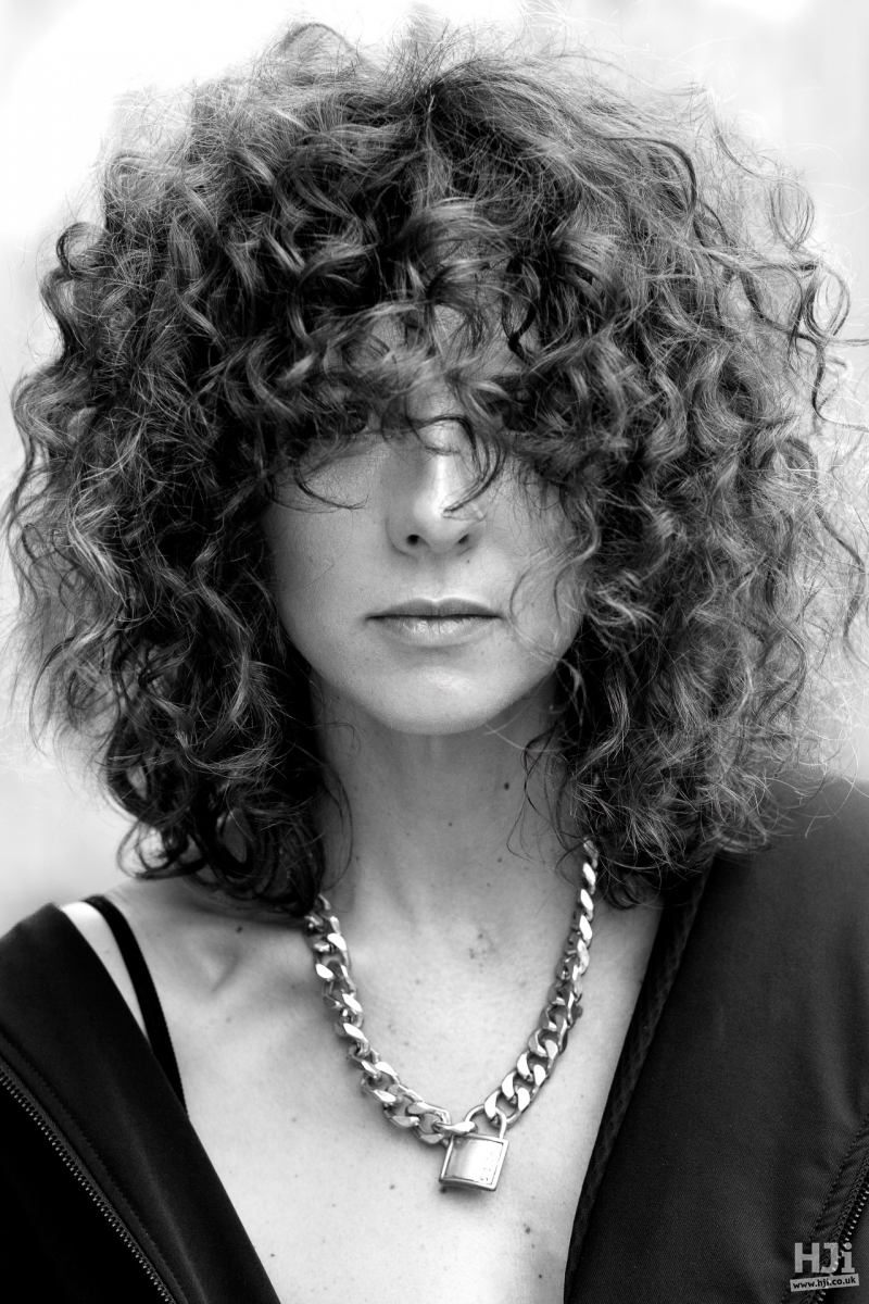 Layered curly textured hair